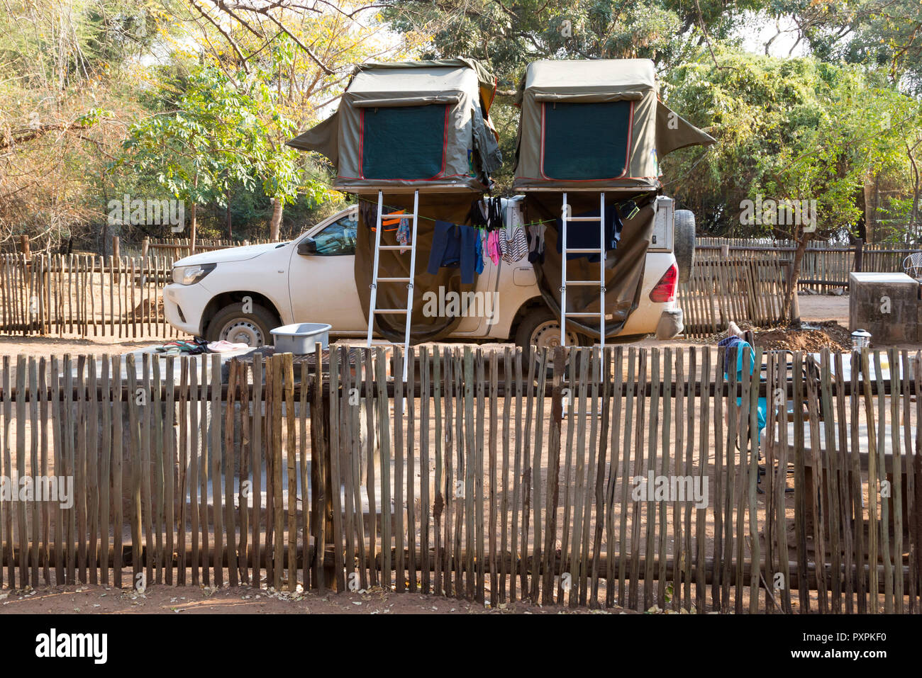 Offroad 4x4 vehicle with tent in the roof ready for camping in the ...