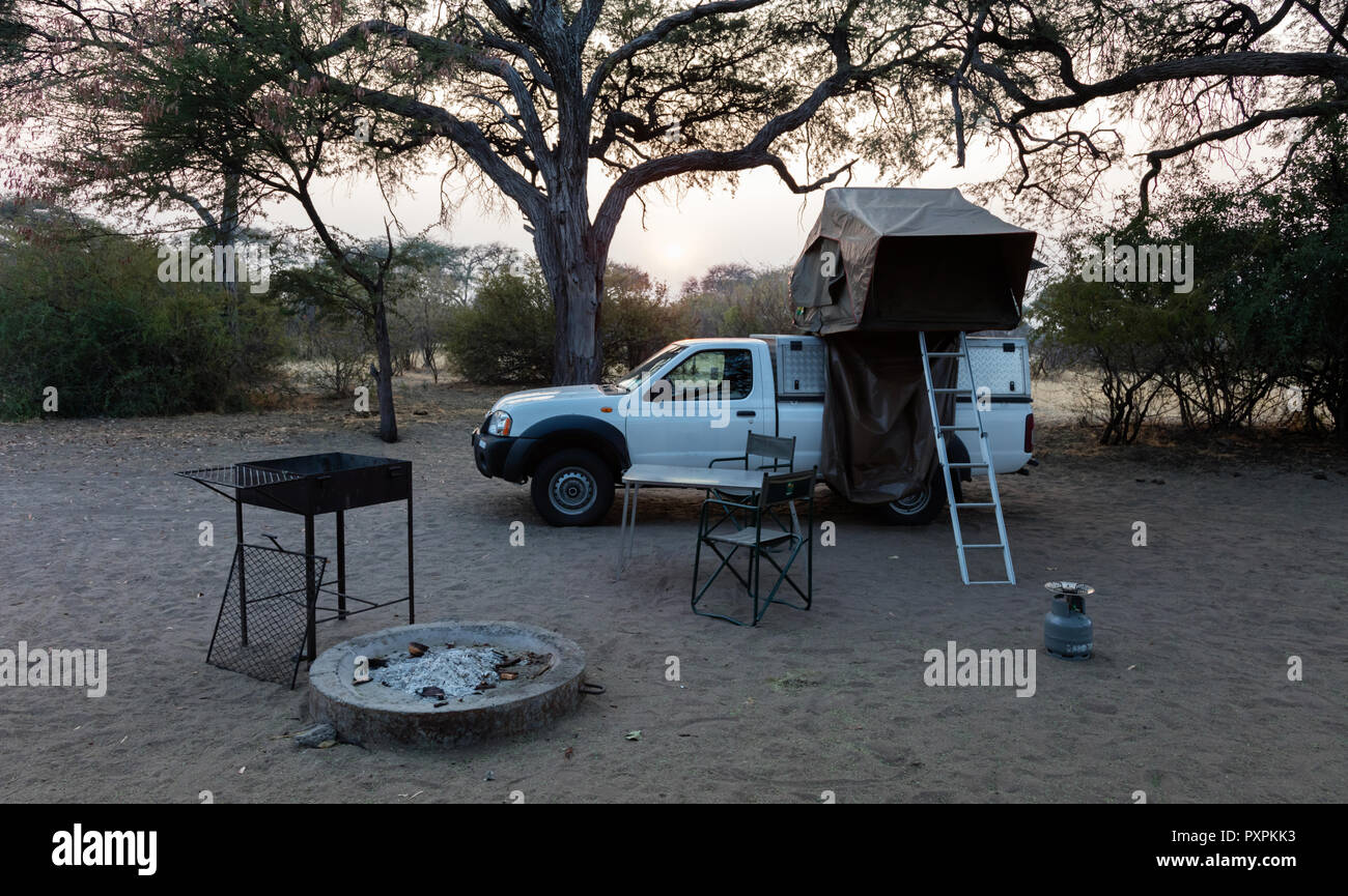 Offroad 4x4 vehicle with tent in the roof ready for camping in the ...