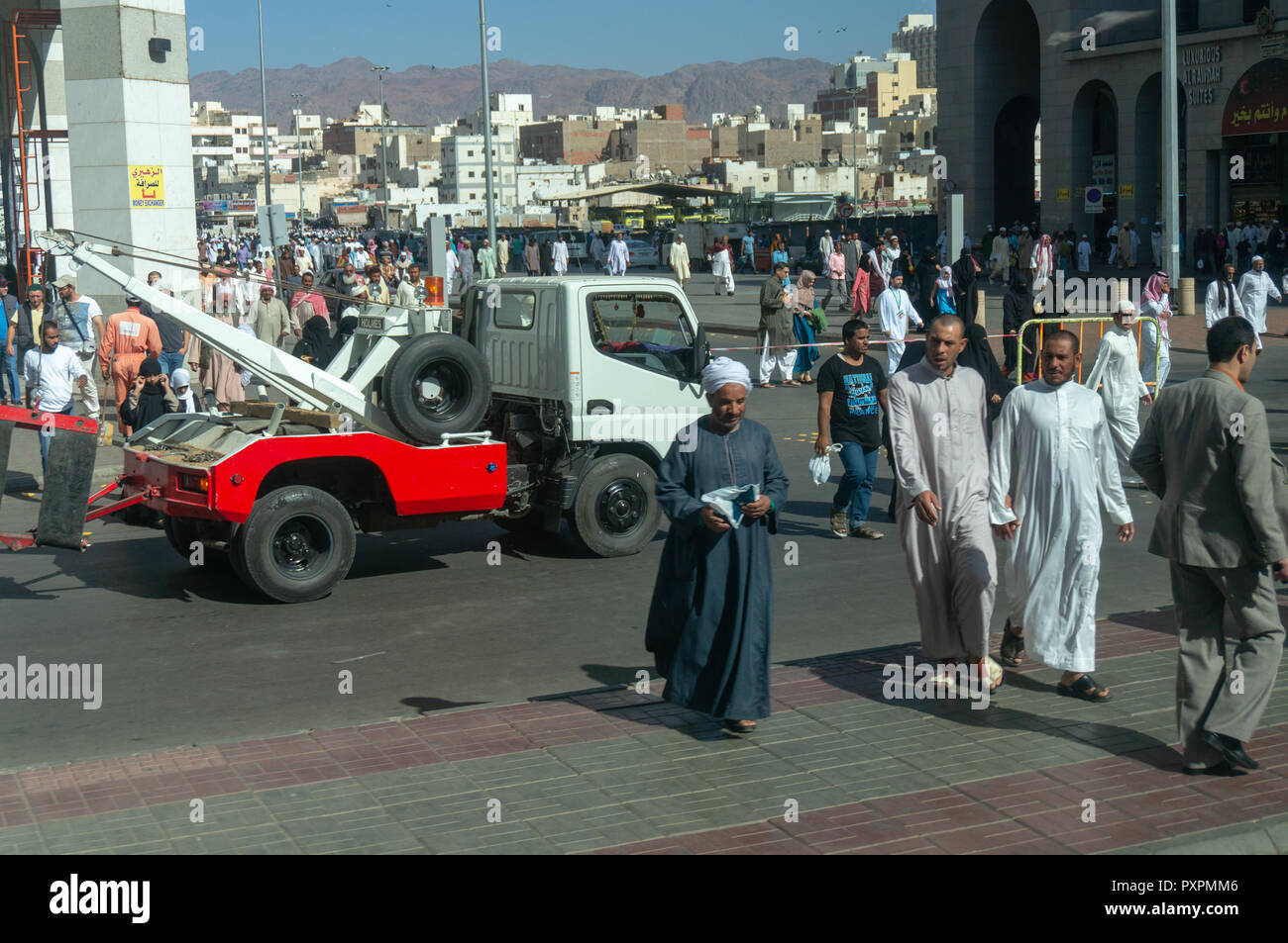 MEDINA, SAUDI ARABIA-CIRCA 2014: Street view of Muslims going to Nabawi ...