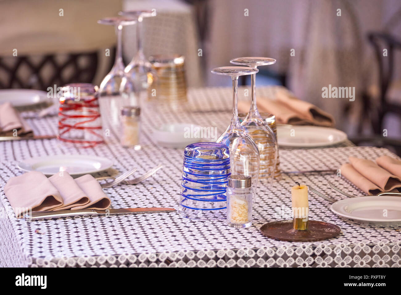 Laid table. Table setting. Preparing to feast Stock Photo - Alamy
