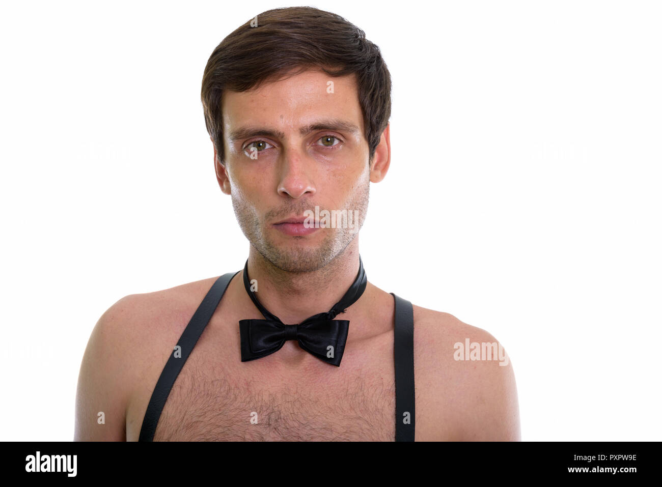 Close up of young handsome man wearing suspenders and bow tie sh Stock ...