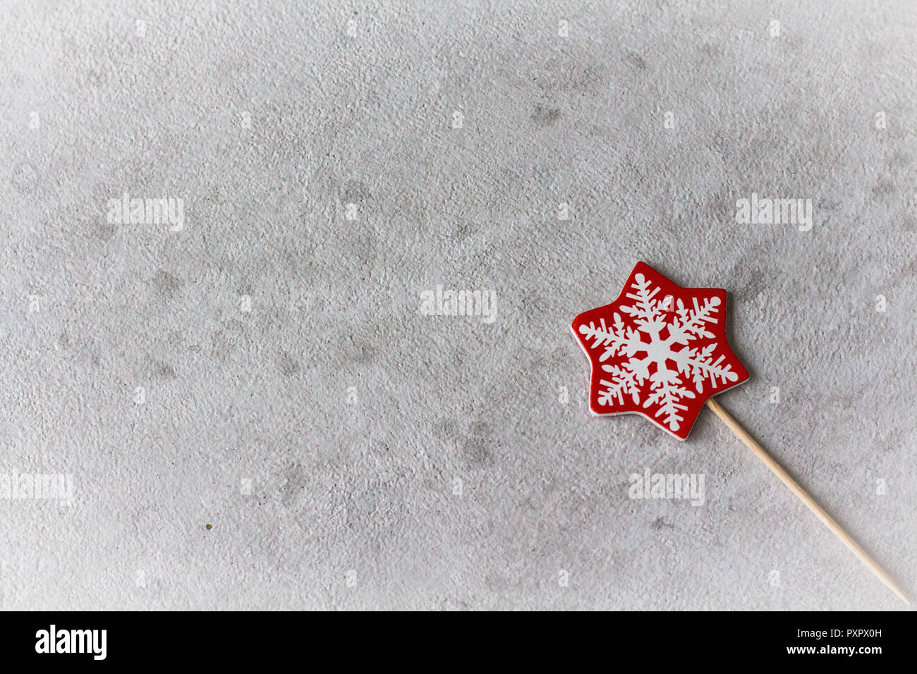 Christmas flakes on a red background hi-res stock photography and ...