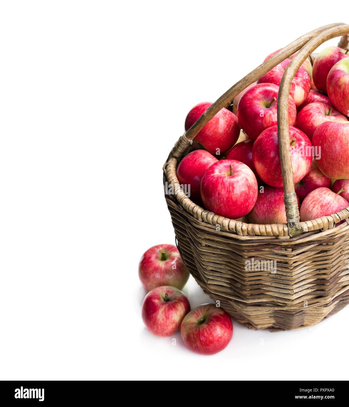 Big basket full of fresh apples isolated on white Stock Photo - Alamy