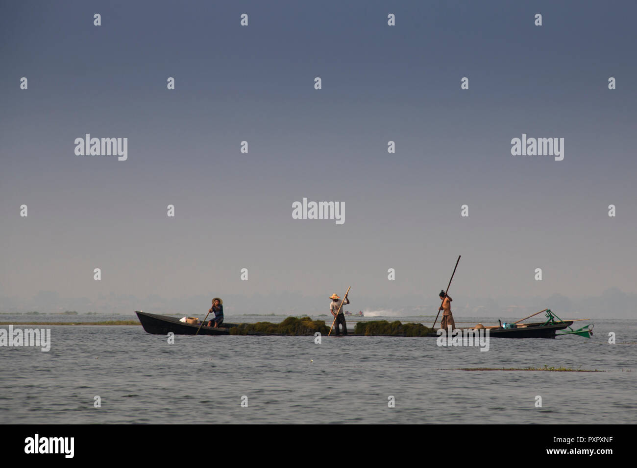 INLE LAKE, MYANMAR - MARCH 2018: Typical fishermen on Inle Lake, one of ...