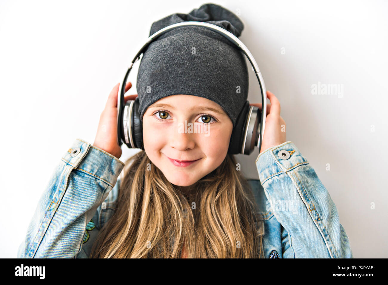 Portrait of a little girl. Studio photography of girl have toque on ...