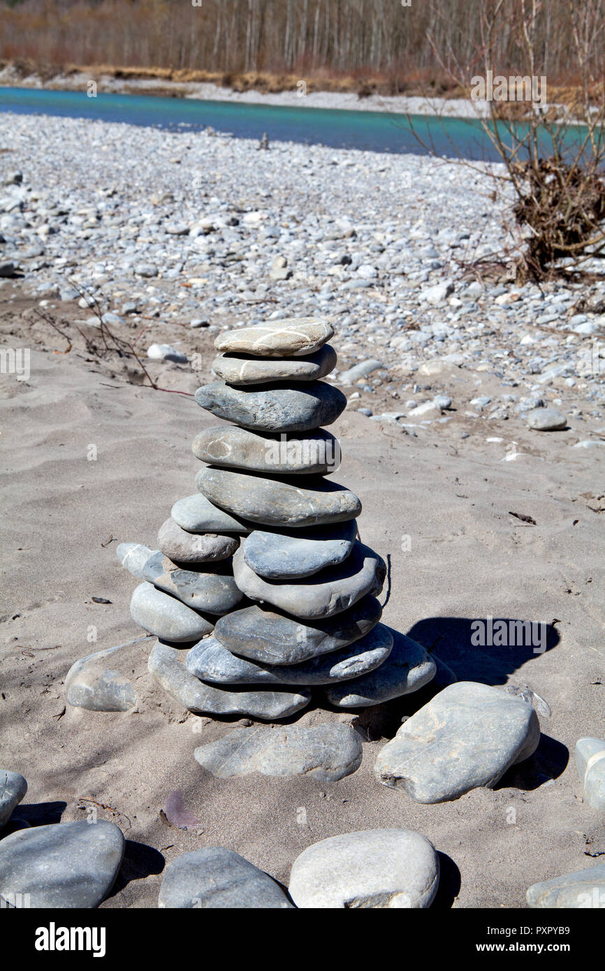 Zen stone tower at the river Stock Photo - Alamy