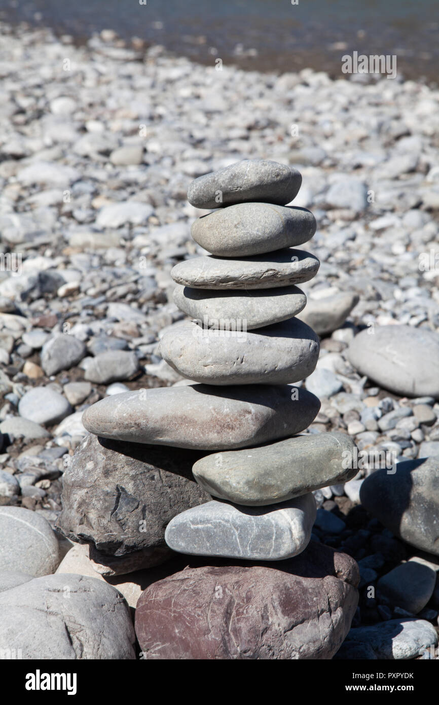Zen stone tower at the river Stock Photo - Alamy