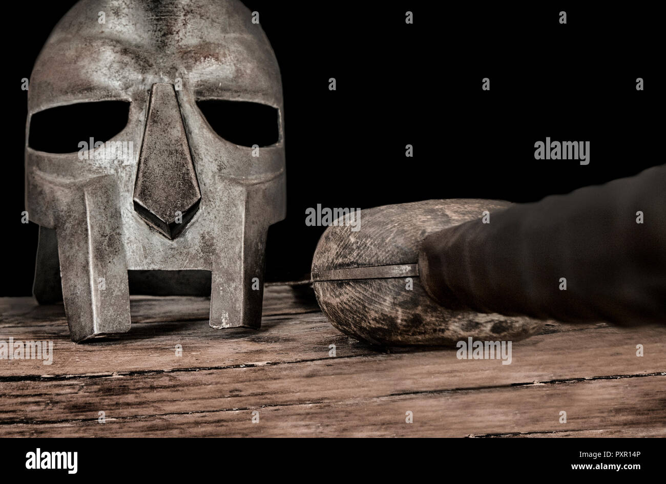 Gladiator tables with helmet wooden training sword. Ancient roman ...