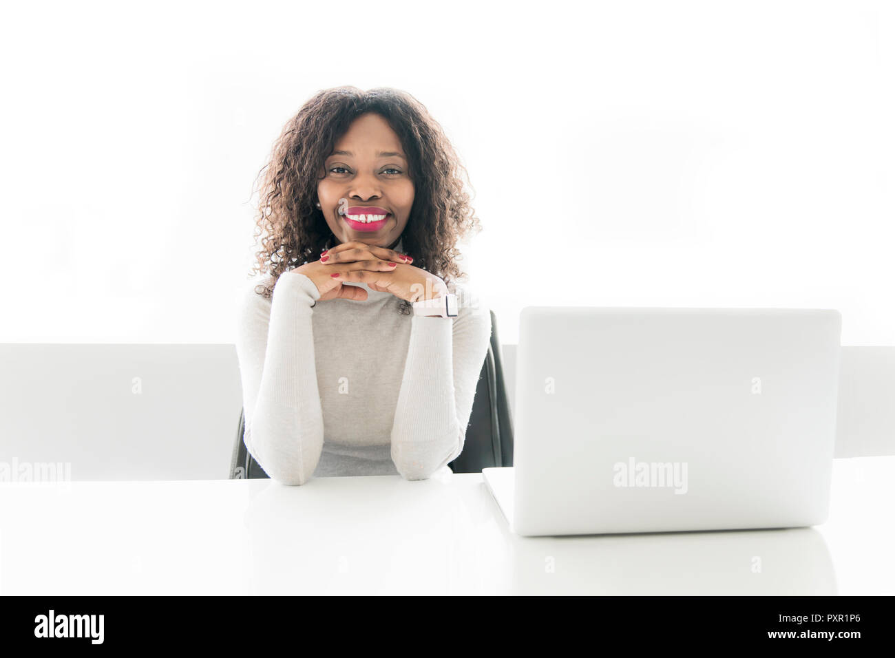 Happy woman employee workplace Cut Out Stock Images & Pictures - Alamy