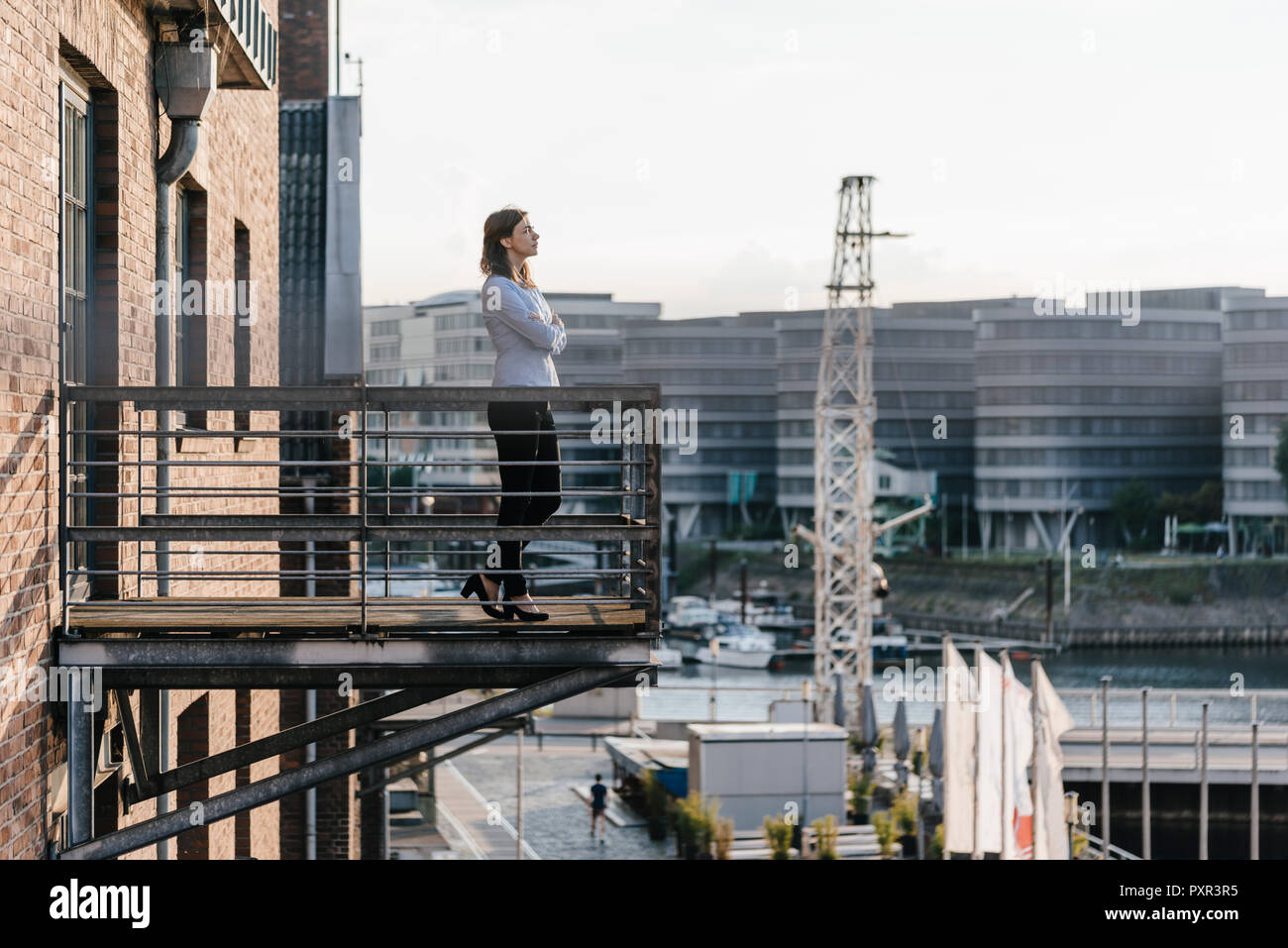 Standing on their balcony hi-res stock photography and images - Alamy