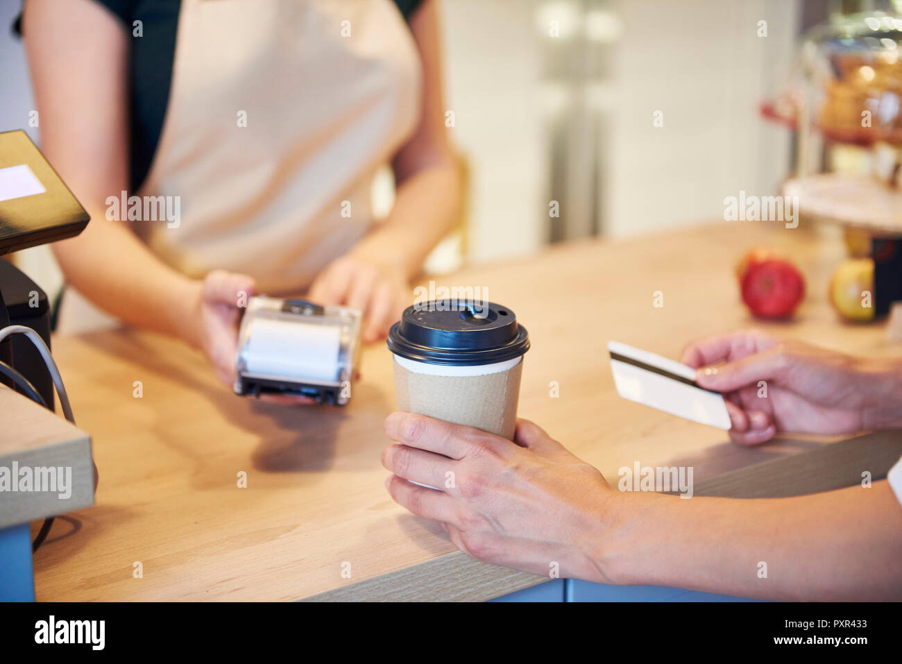 Paying cafe credit card hi-res stock photography and images - Alamy