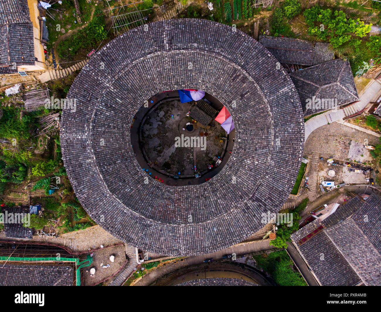 China, Fujian Province, aerial view of a tulou in a Hakka village Stock ...