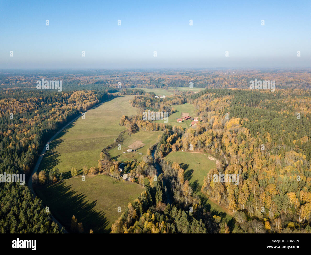 drone image. aerial view of rural area with fields and forests in ...