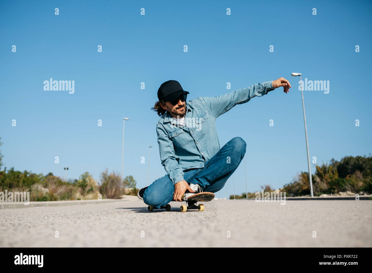 Male skater in trendy hi-res stock photography and images - Alamy