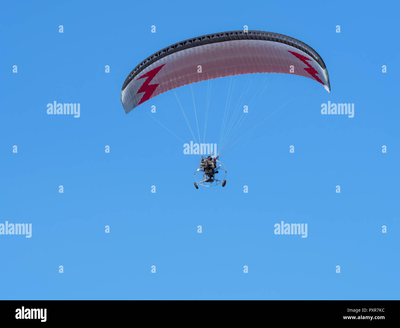 paraglider, glider pilot with motor, paragliding Stock Photo - Alamy
