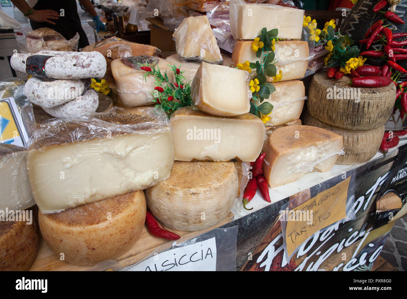 Cheese stall at an open market in central Naples Stock Photo - Alamy