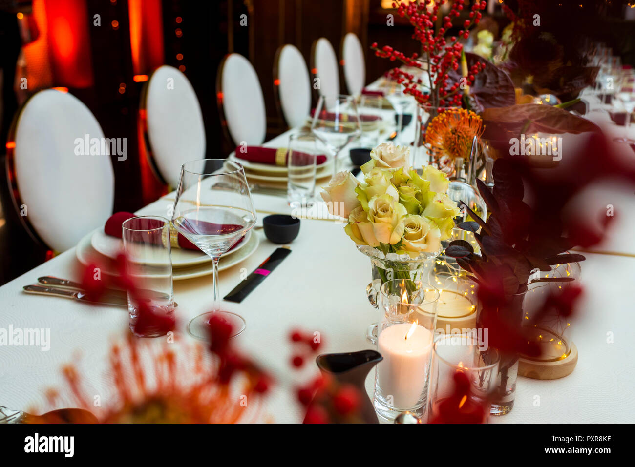 napkin in a ring on a plate in a restaurant Stock Photo - Alamy