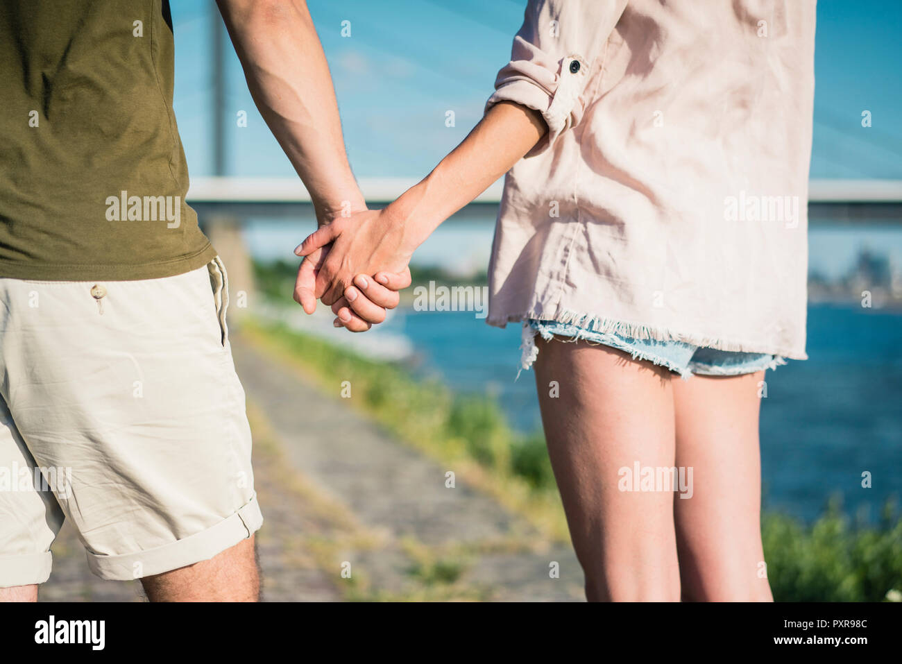 Couple hand in hand hi-res stock photography and images - Alamy