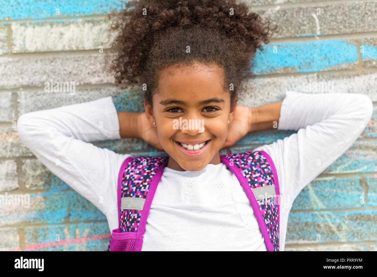 cheerful african american primary school girl with backpack Stock Photo ...