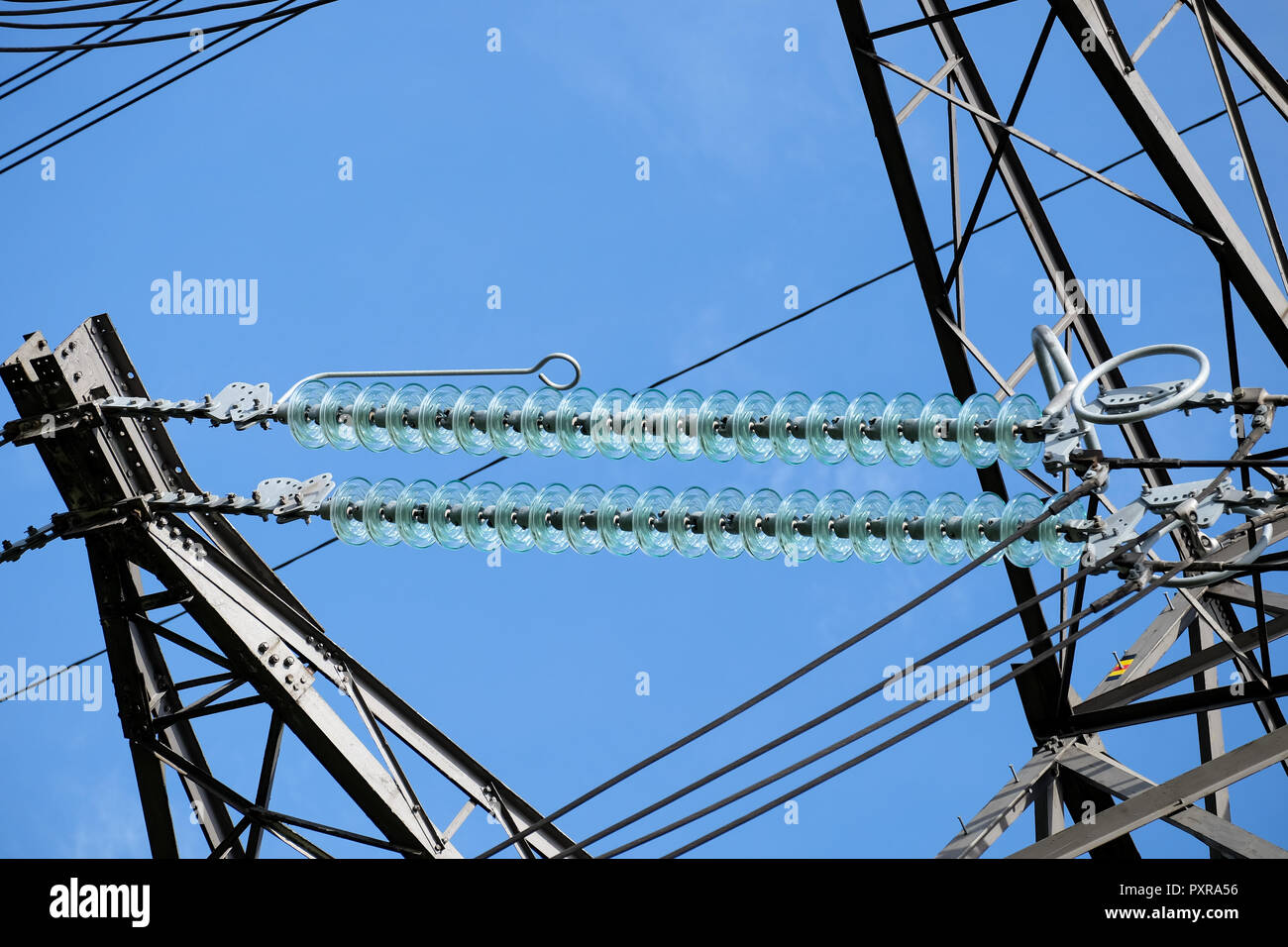 power lines on a pylon Stock Photo - Alamy
