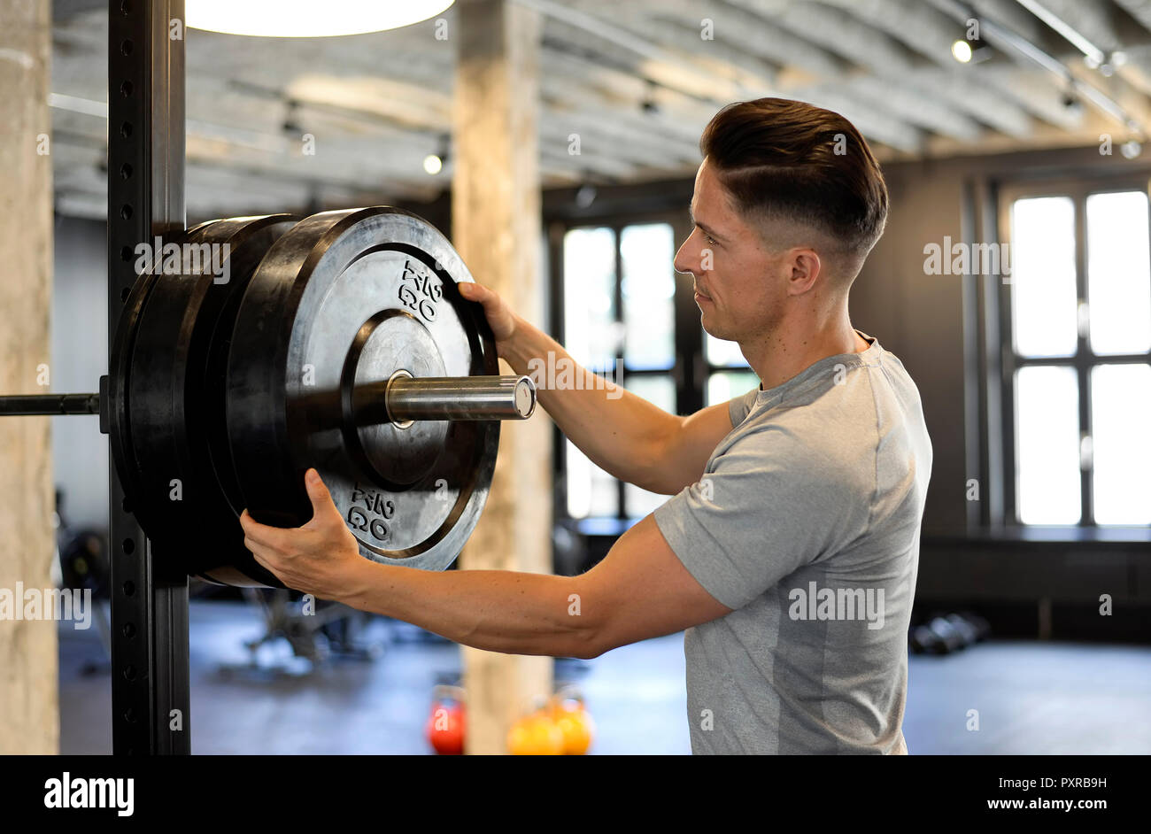 Men lifting barbells gym hi-res stock photography and images - Alamy