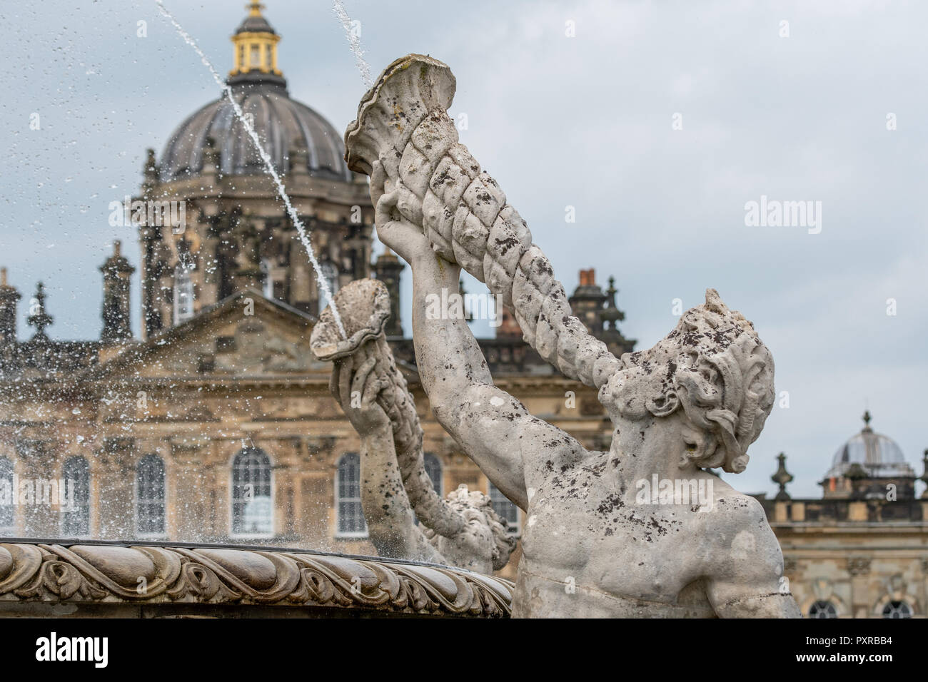 Castle Howard with Fountain and Sculpture of man blowing conch shell ...