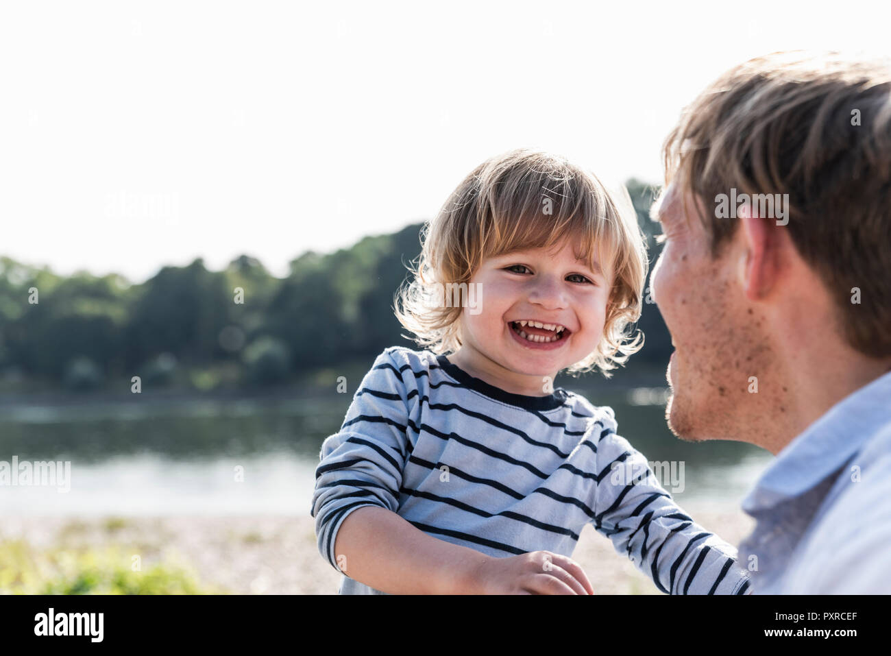 Father son having fun riverside hi-res stock photography and images - Alamy