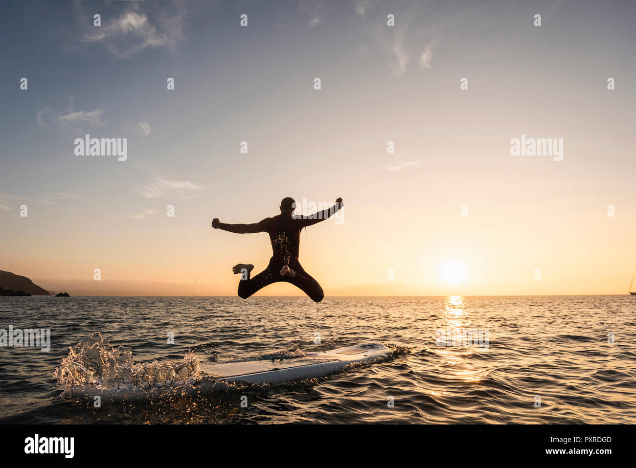 Young man jumps from back hi-res stock photography and images - Alamy