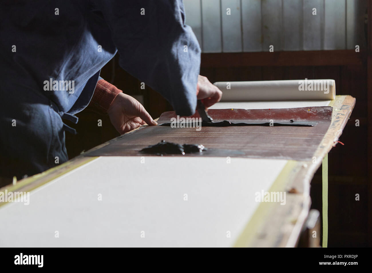 Japanese artisan working in the studio Stock Photo - Alamy