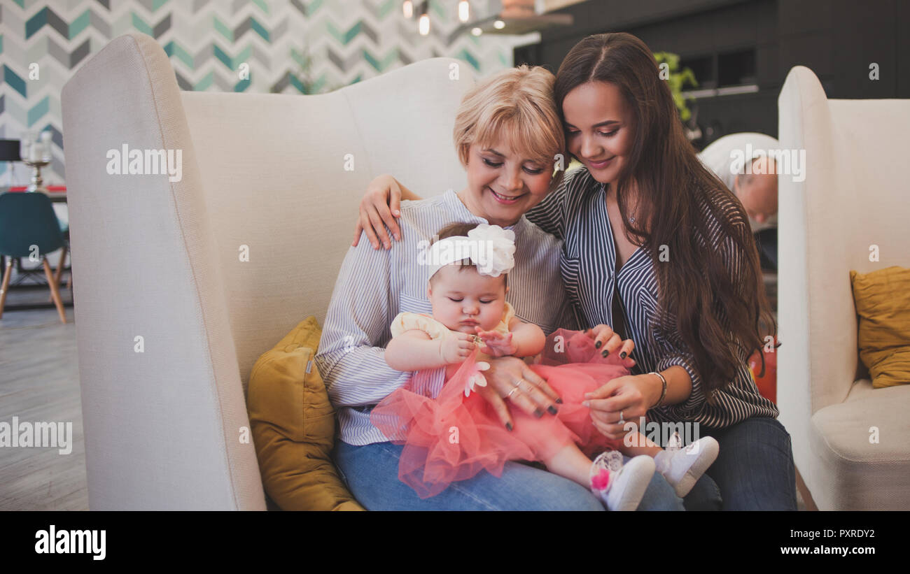 Family dinner. Family receives guests, a festive meeting. Mom and adult ...