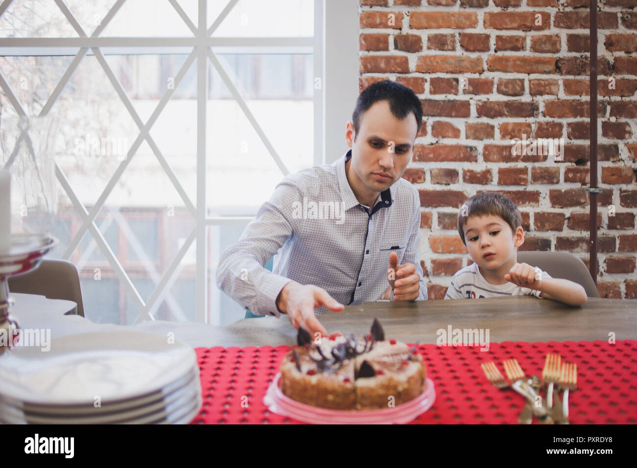Family dinner. Family receives guests, a festive meeting. Father and ...