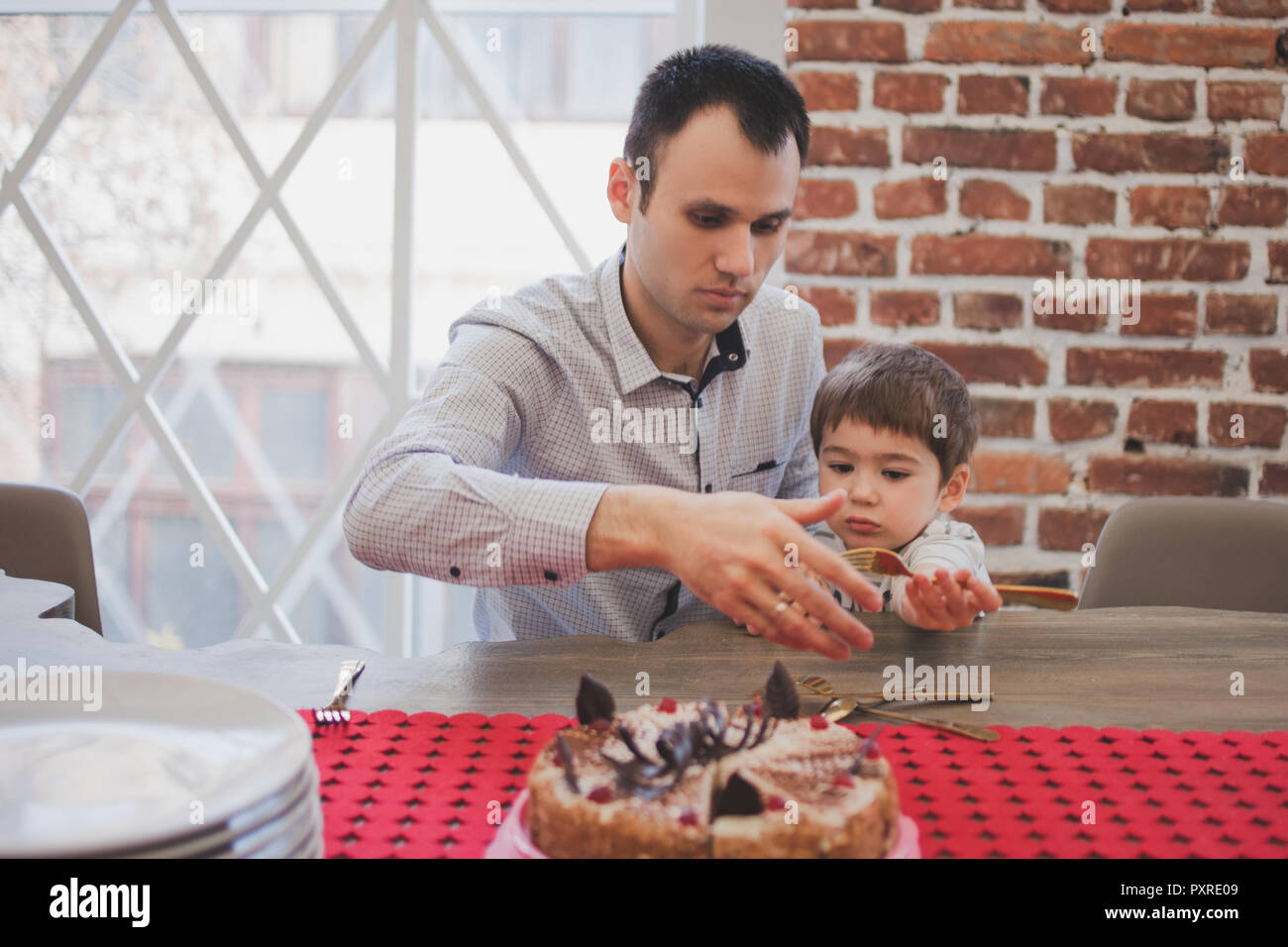 Family dinner. Family receives guests, a festive meeting. Father and ...