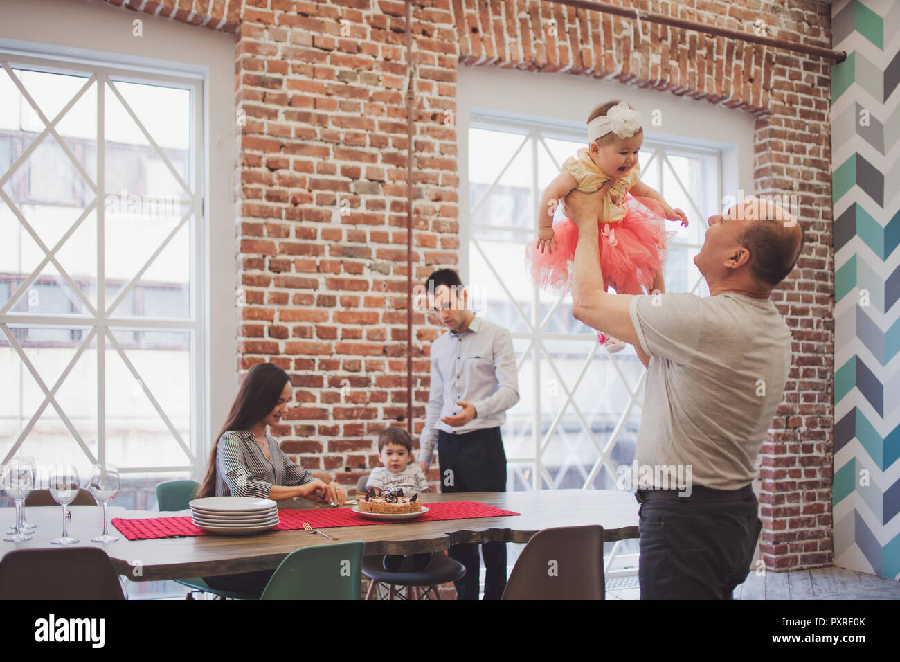 Family dinner. Family receives guests, a festive meeting. family serves ...