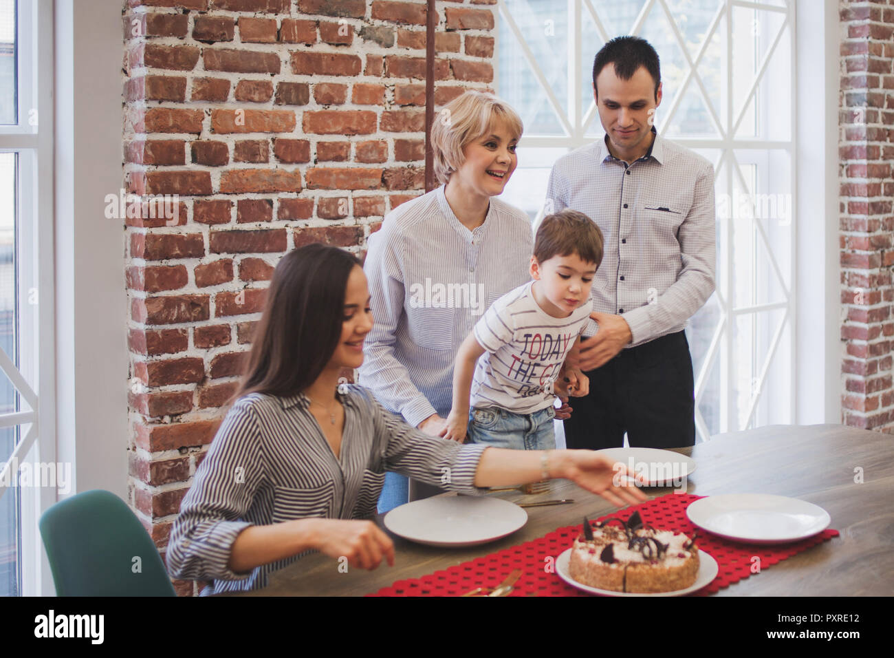 Family dinner. Family receives guests, a festive meeting. family serves ...
