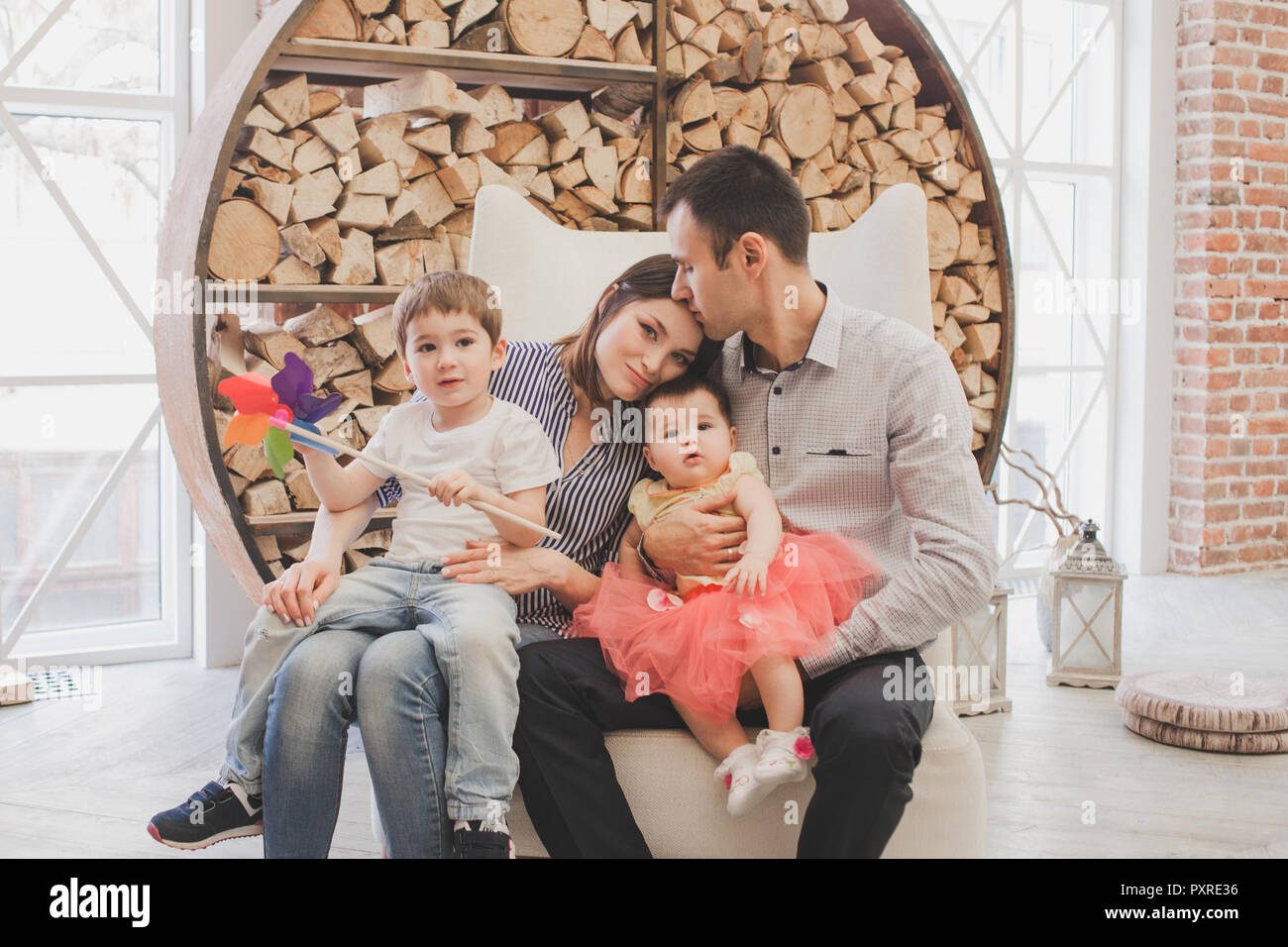 Family dinner. Family receives guests, a festive meeting. Young happy ...