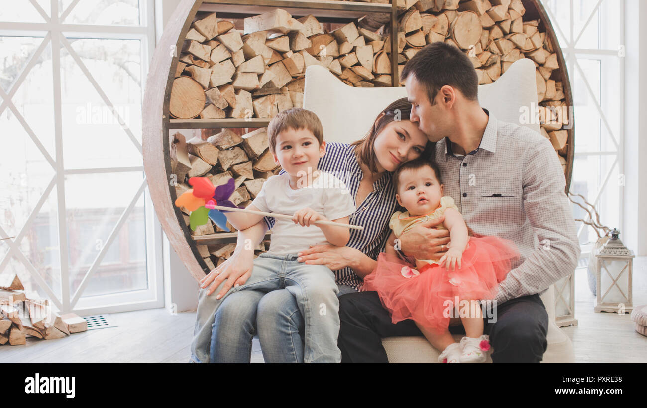Family dinner. Family receives guests, a festive meeting. Young happy ...