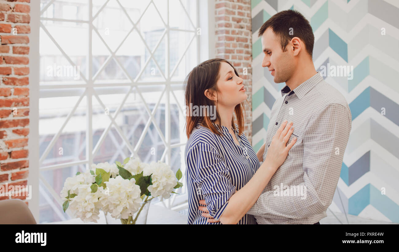 Family dinner. Family receives guests, a festive meeting. Young happy ...