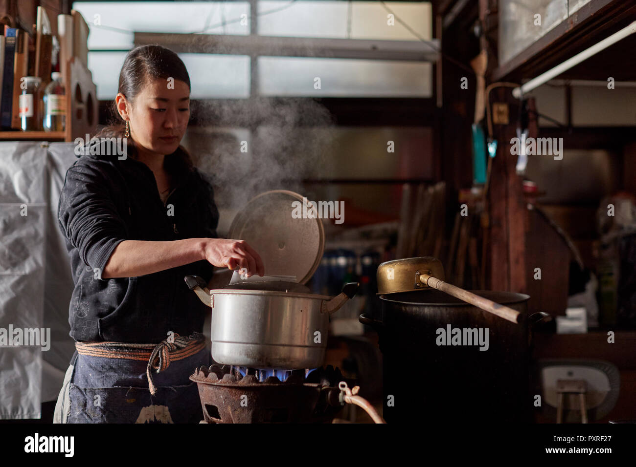 Japanese artisan working in the studio Stock Photo - Alamy
