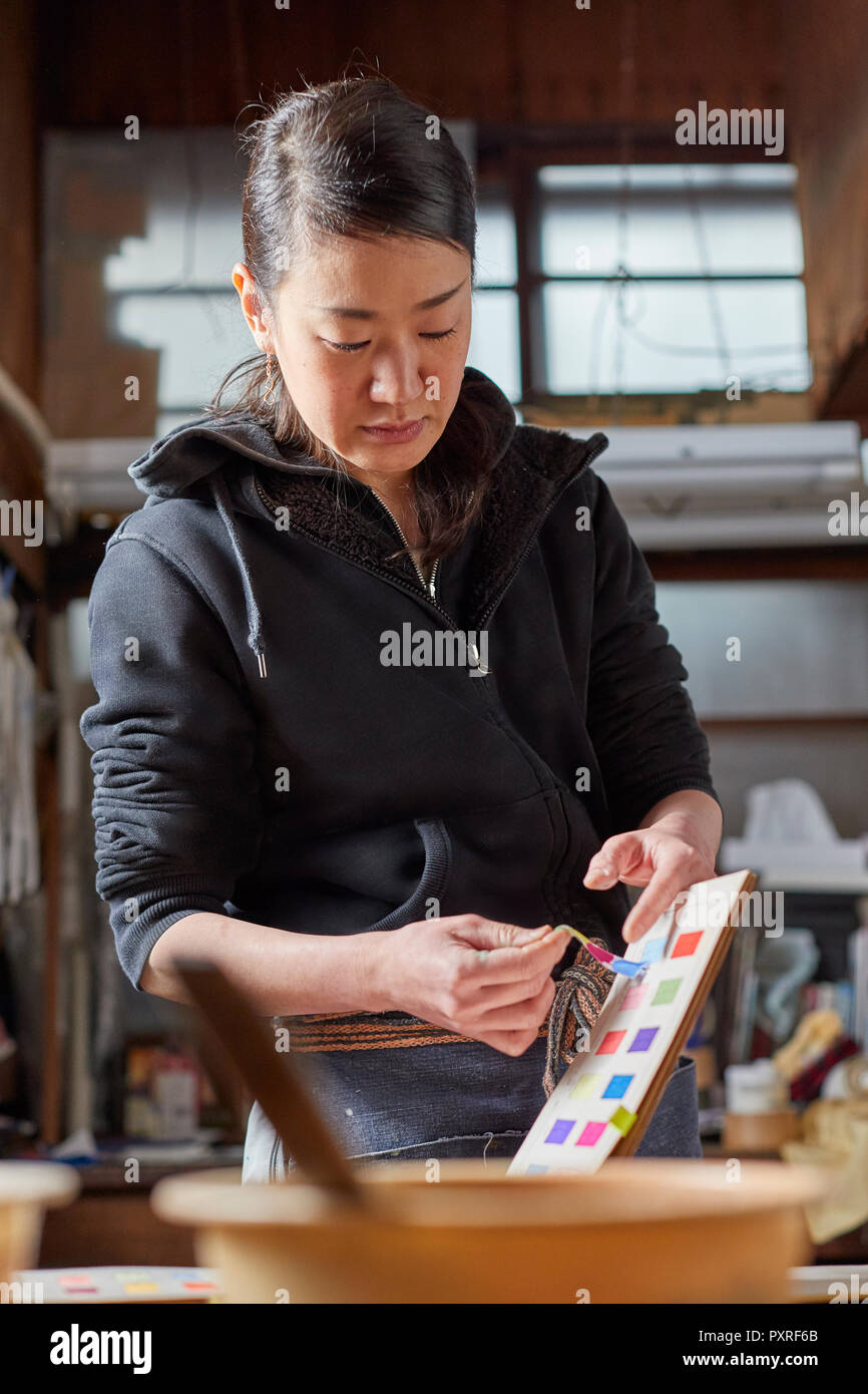 Japanese artisan working in the studio Stock Photo - Alamy