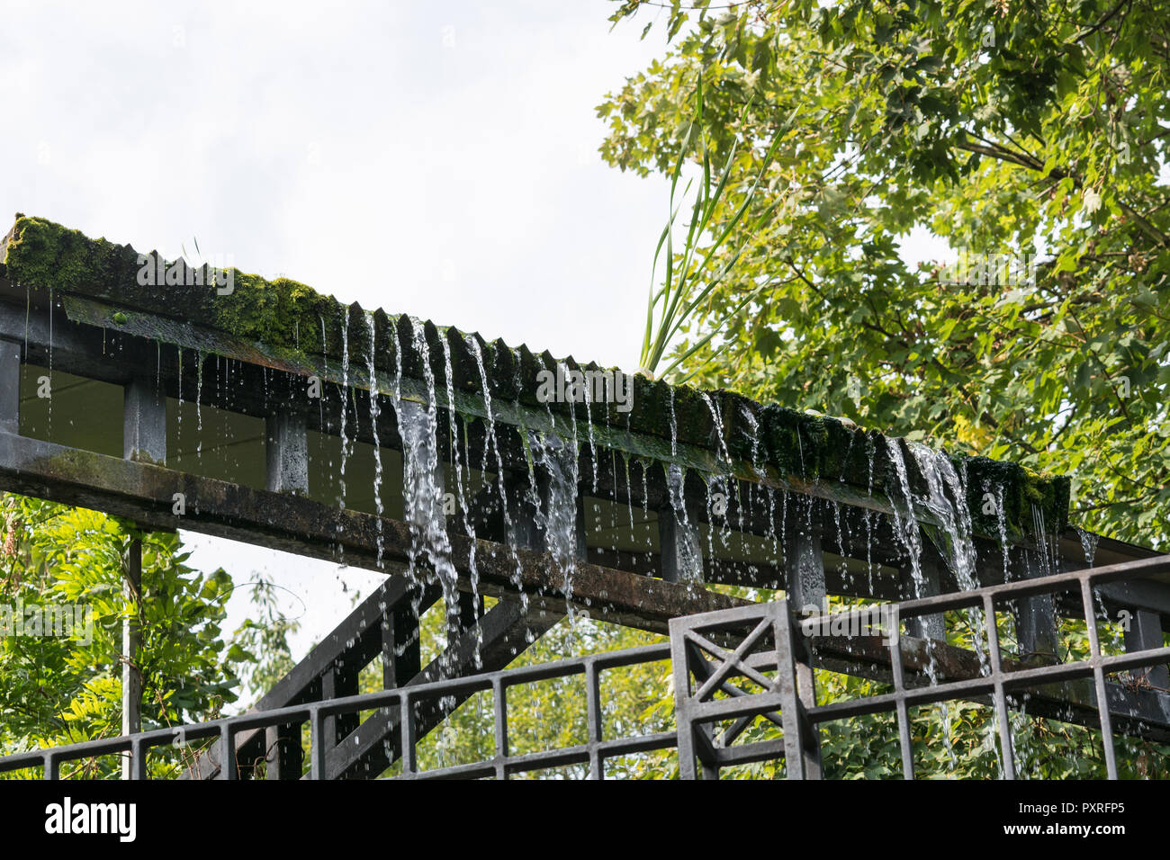 Small weir waterfall in a public park Stock Photo - Alamy