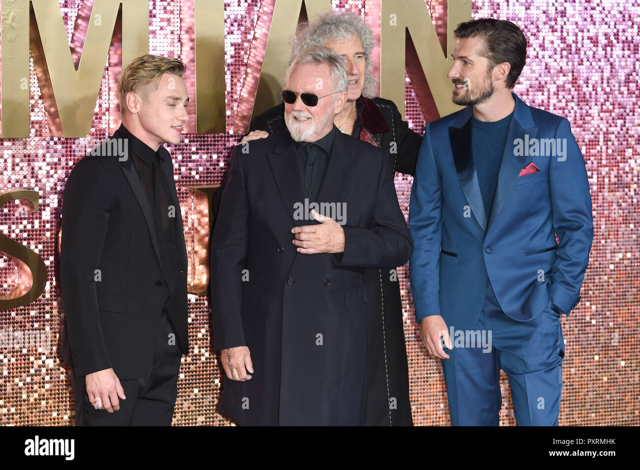 London, UK. 23rd October, 2018. Ben Hardy, Roger Taylor, Brian May ...