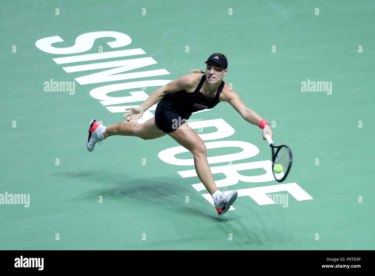 Singapore. 24th Oct, 2018. Angelique Kerber of Germany returns a shot ...