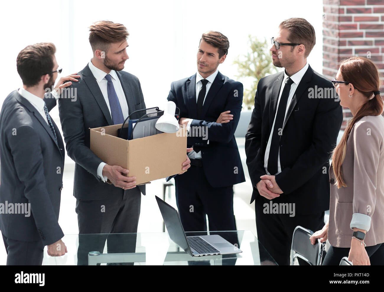 business colleagues say goodbye to the dismissed employee Stock Photo ...