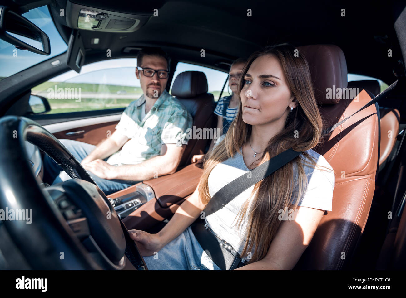 mom driving a family car Stock Photo - Alamy