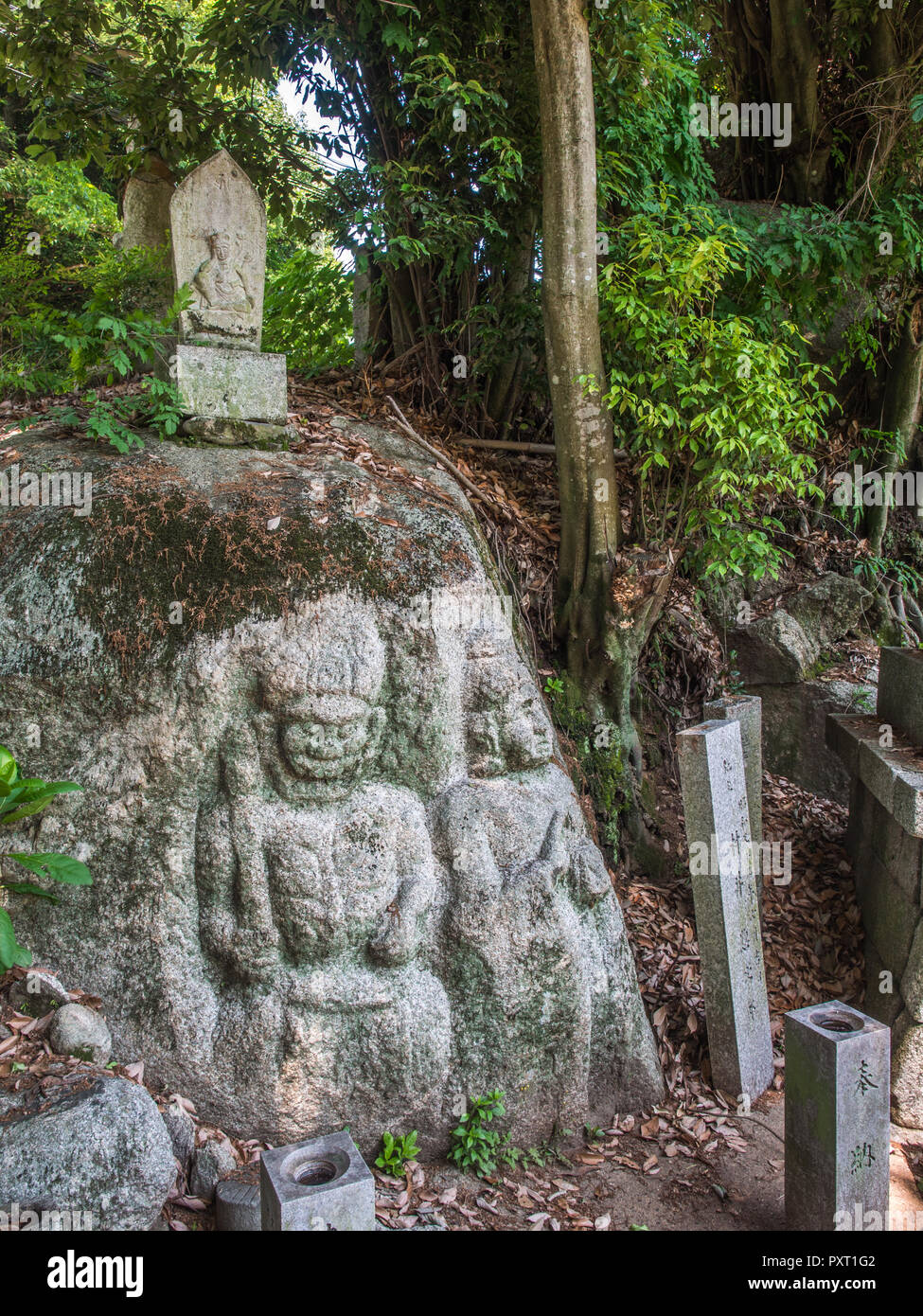 Fudo myo o image carved into rock hi-res stock photography and images ...