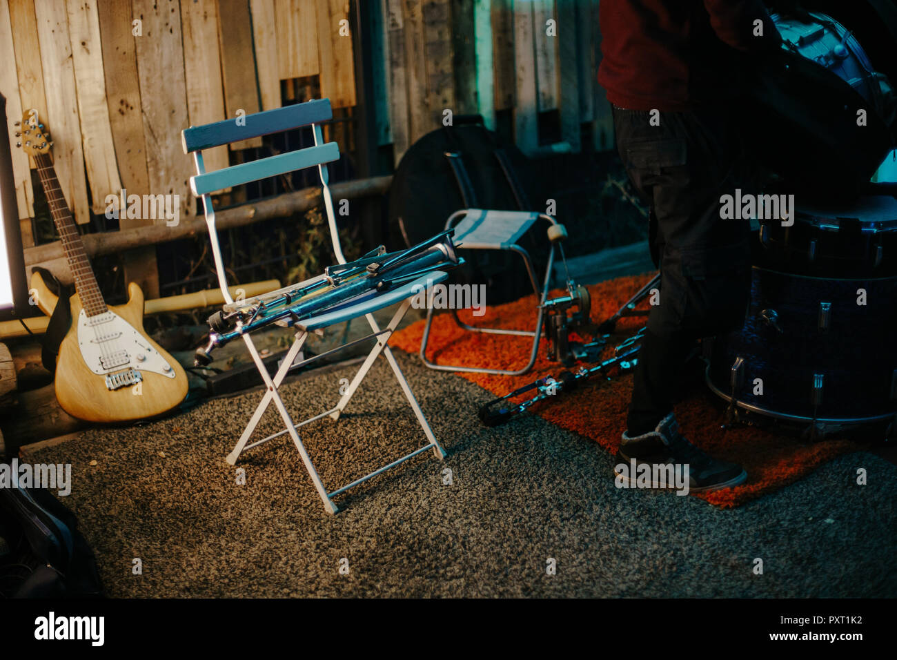 photo of a Musician who is packing his instruments after a gig at a ...