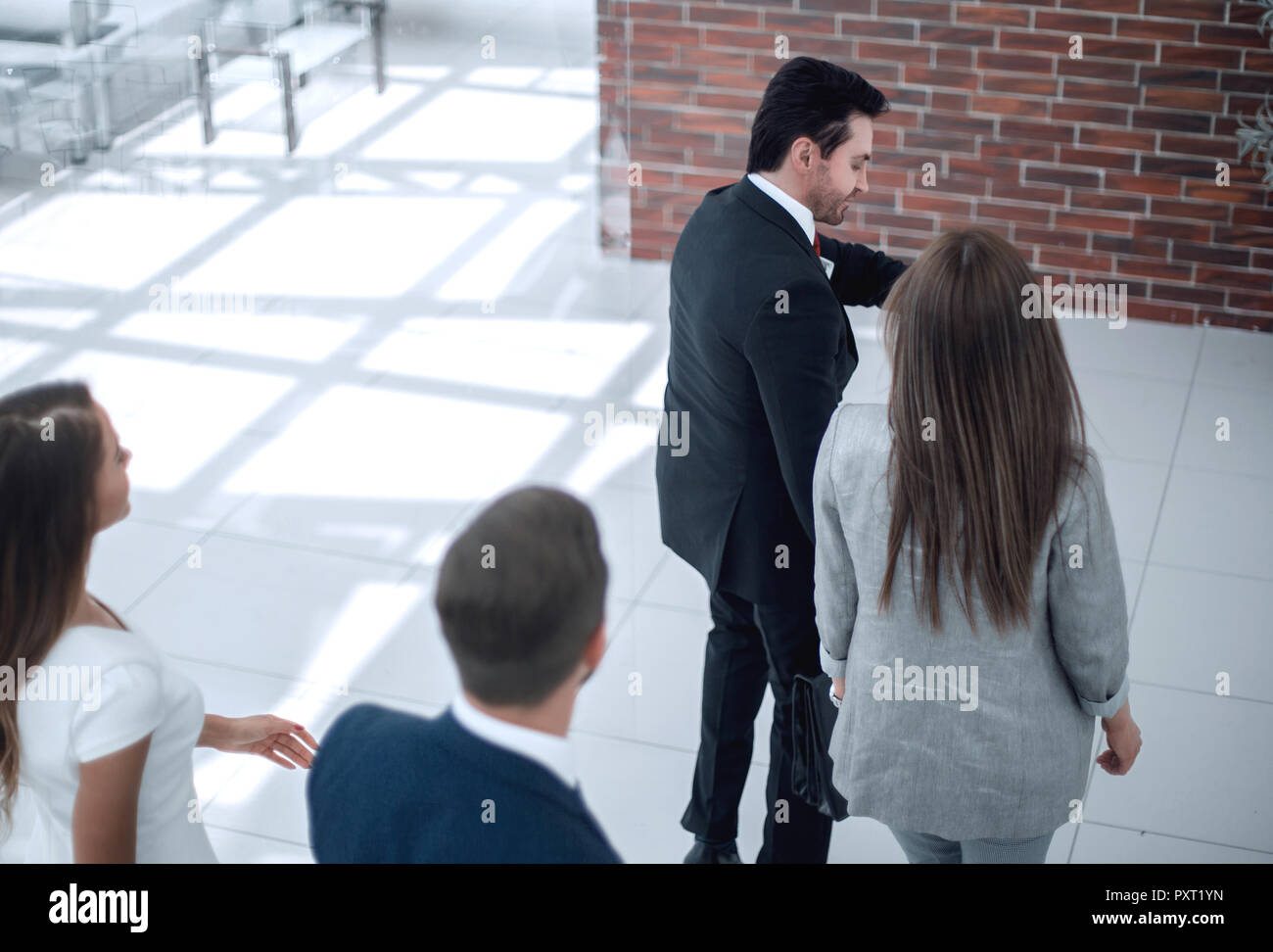 background image.group of employees, late for work Stock Photo - Alamy