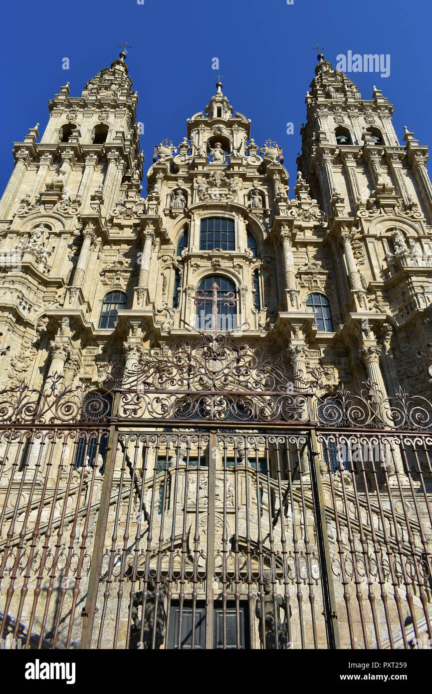 Cathedral: Perspective from below with clean stone and old iron gate ...