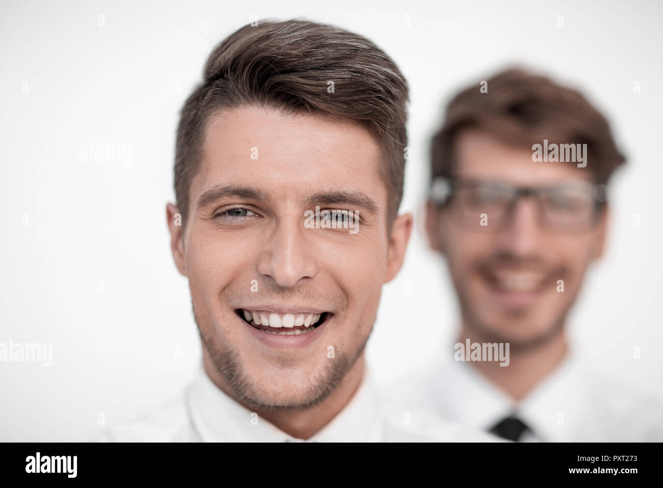 portrait two of an attractive young businessman smiling Stock Photo - Alamy