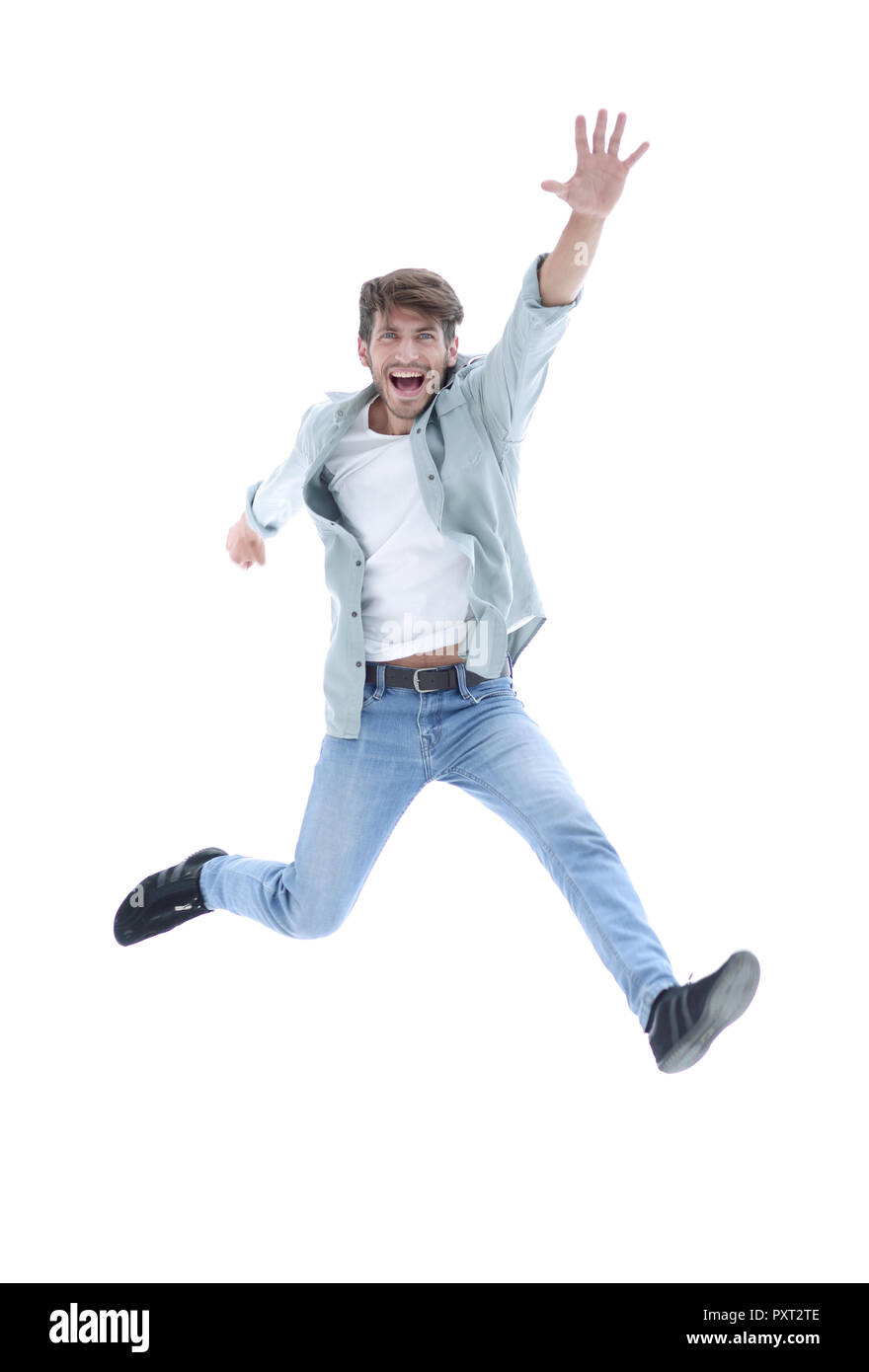 Happy man jumping in air over white background Stock Photo - Alamy